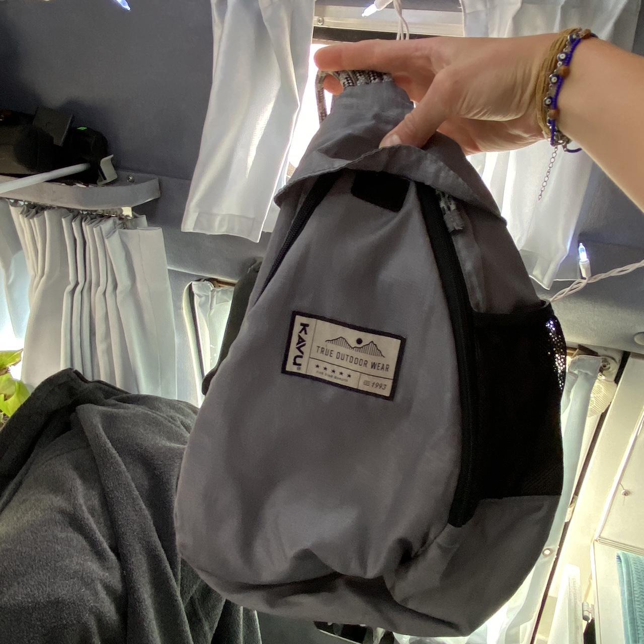grey Kavu crossbody backpack, in rougher condition,... - Depop