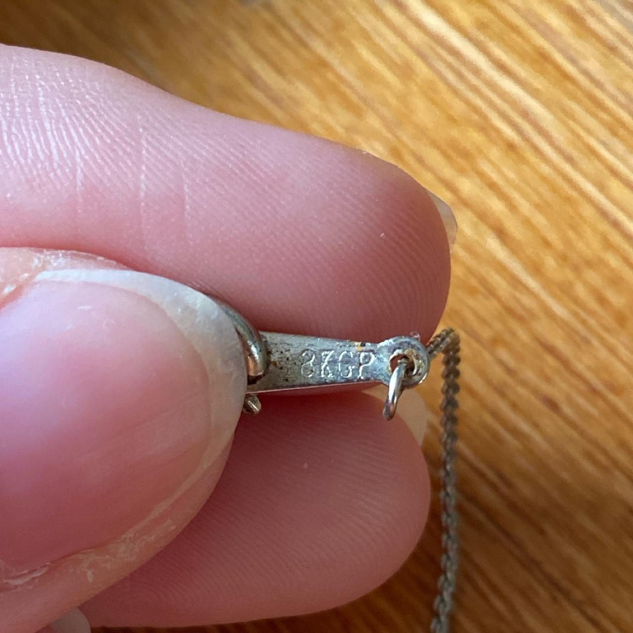 18KGP white gold cage Pearl necklace. Cage does open - Depop