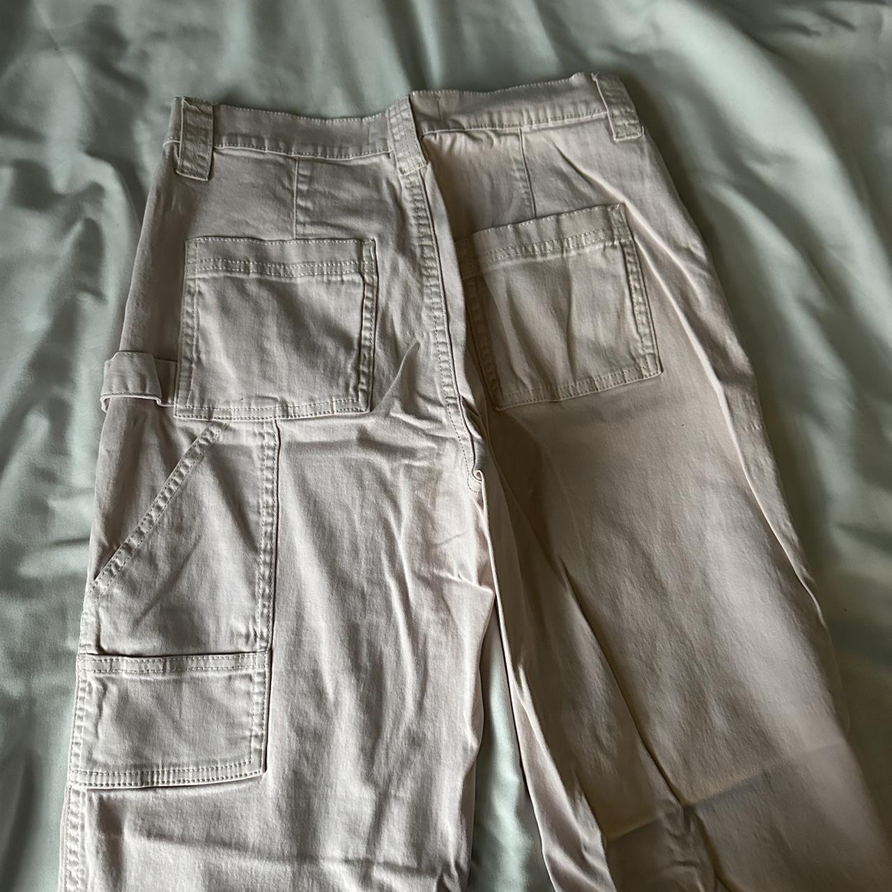 cream colored cargo pants - Depop