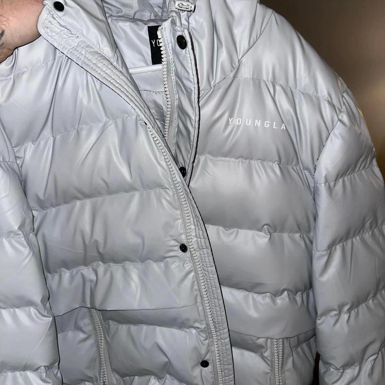 Youngla puffer, small tear in the back but easy fix - Depop