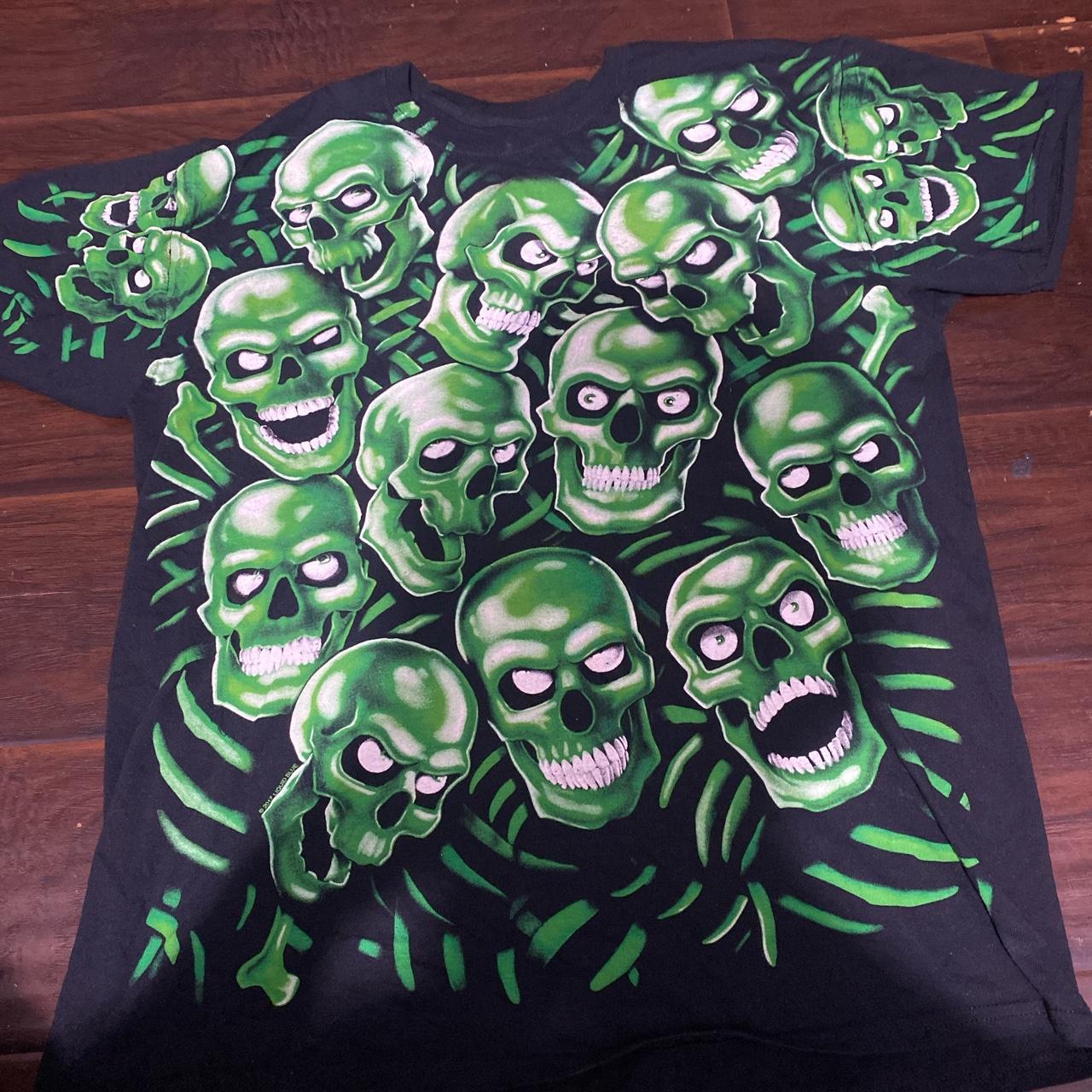 Liquid blue skulls tee printed on front and back... - Depop