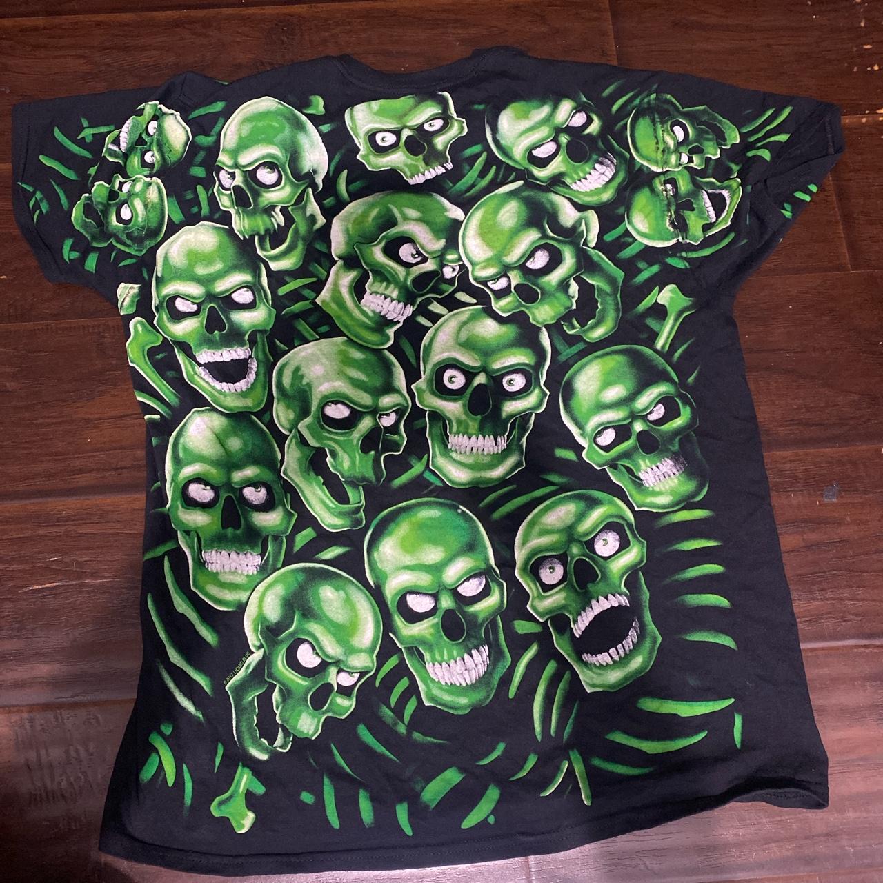 Liquid blue skulls tee printed on front and back... - Depop