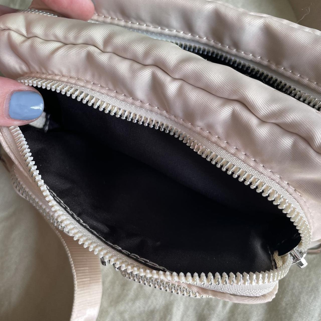 Off white and beige crossbody/belt bag from... - Depop