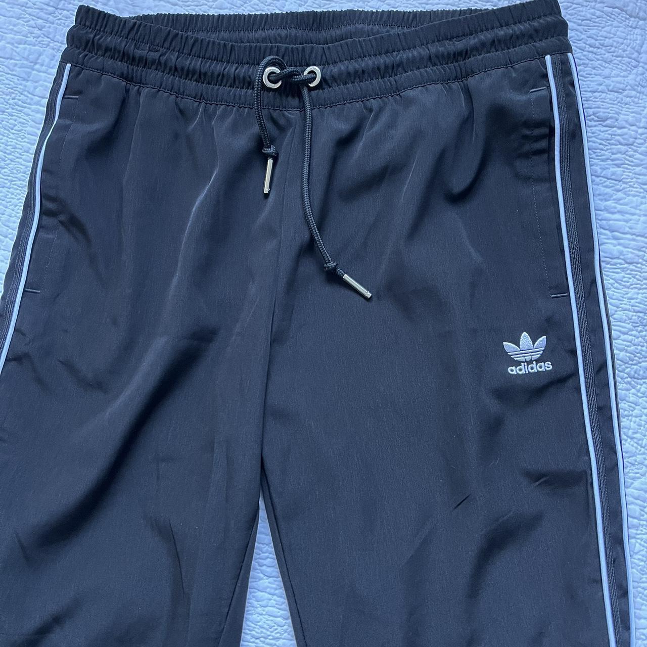 Black Adidas pants, 7/8 length, non-stretch - Depop
