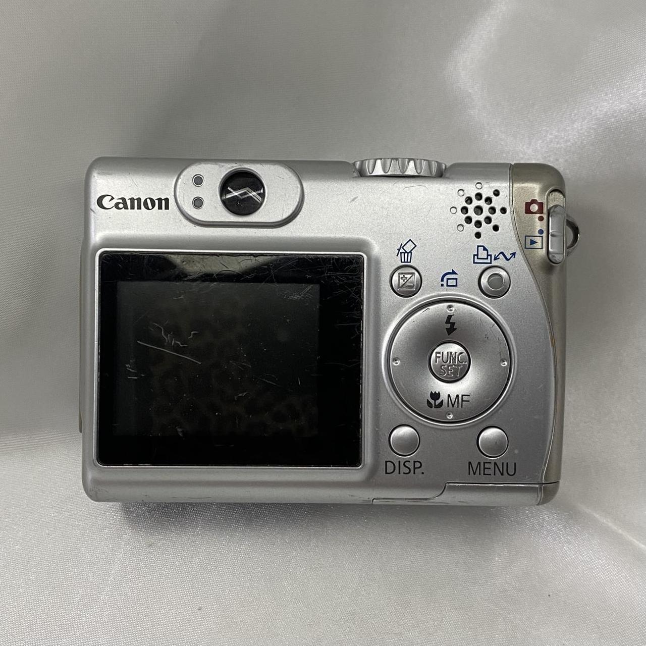 silver and gold canon powershot digital camera🪄... - Depop