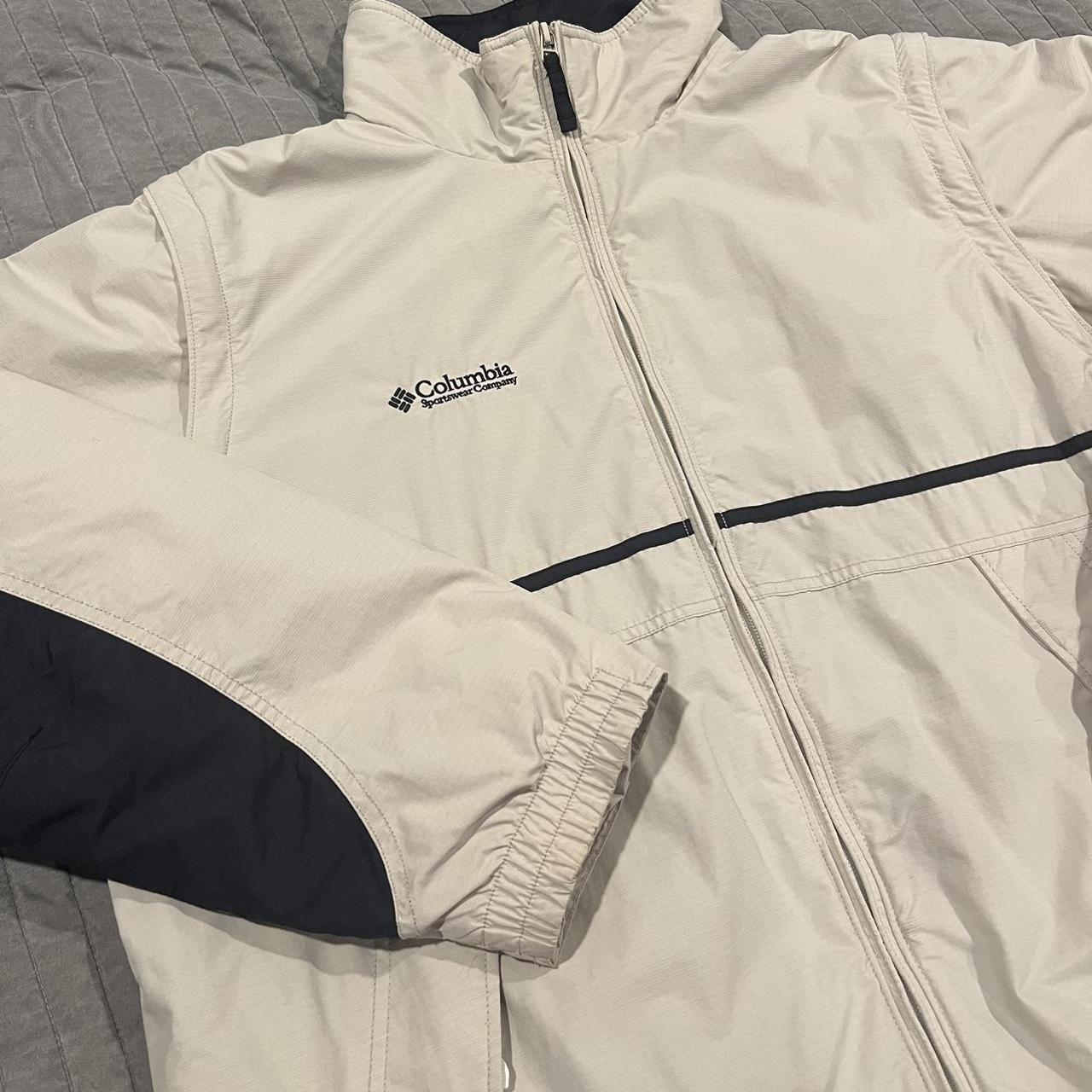 White and black Columbia ski jacket, size Large,... - Depop