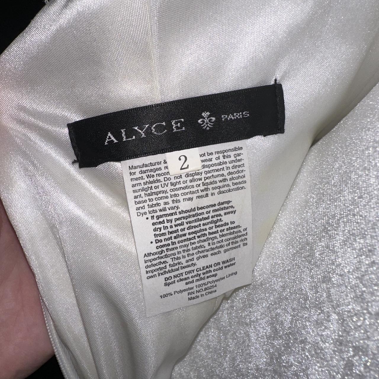 Alyce Paris white bandage dress with open back and... - Depop