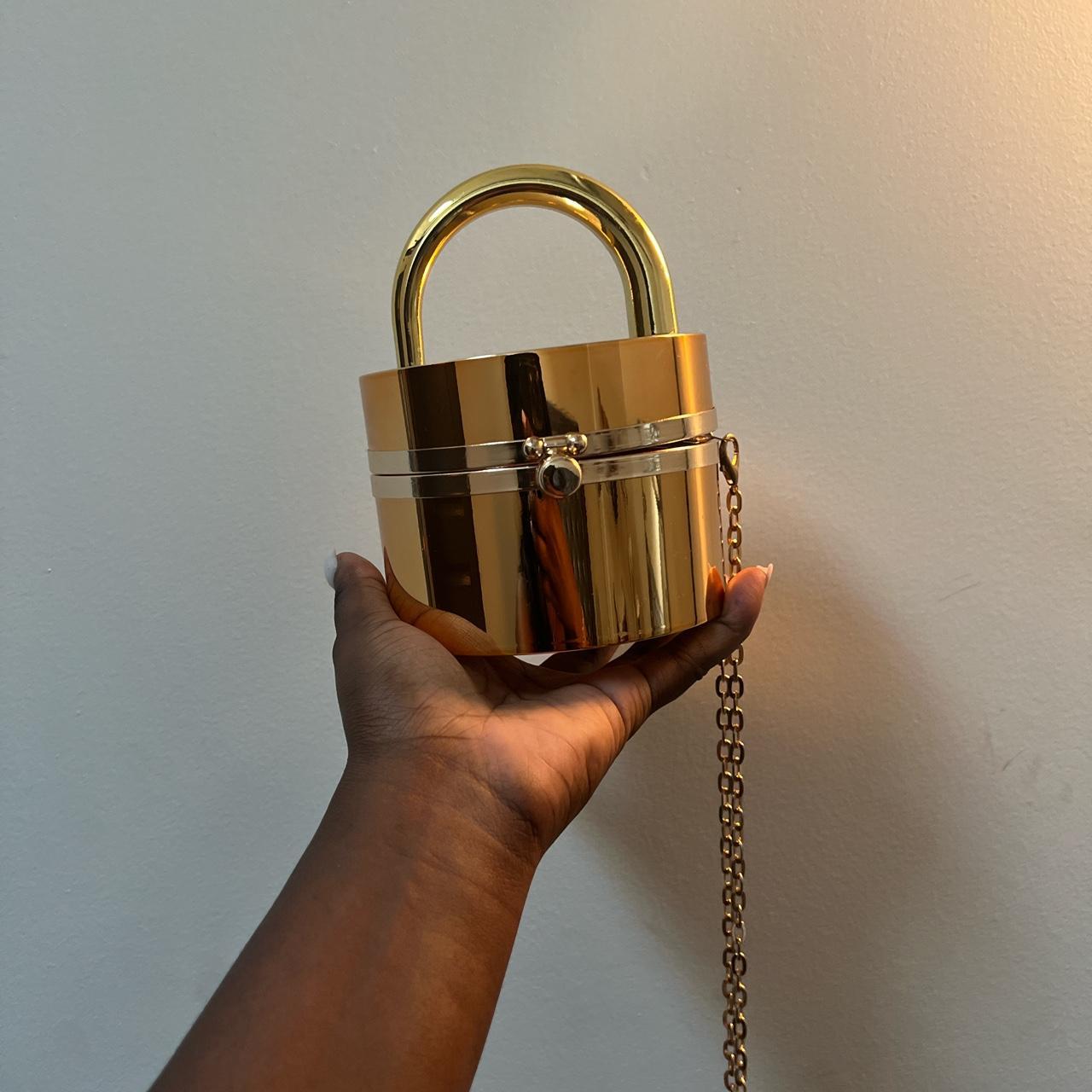Gold hardware cylinder shape handbag - Depop