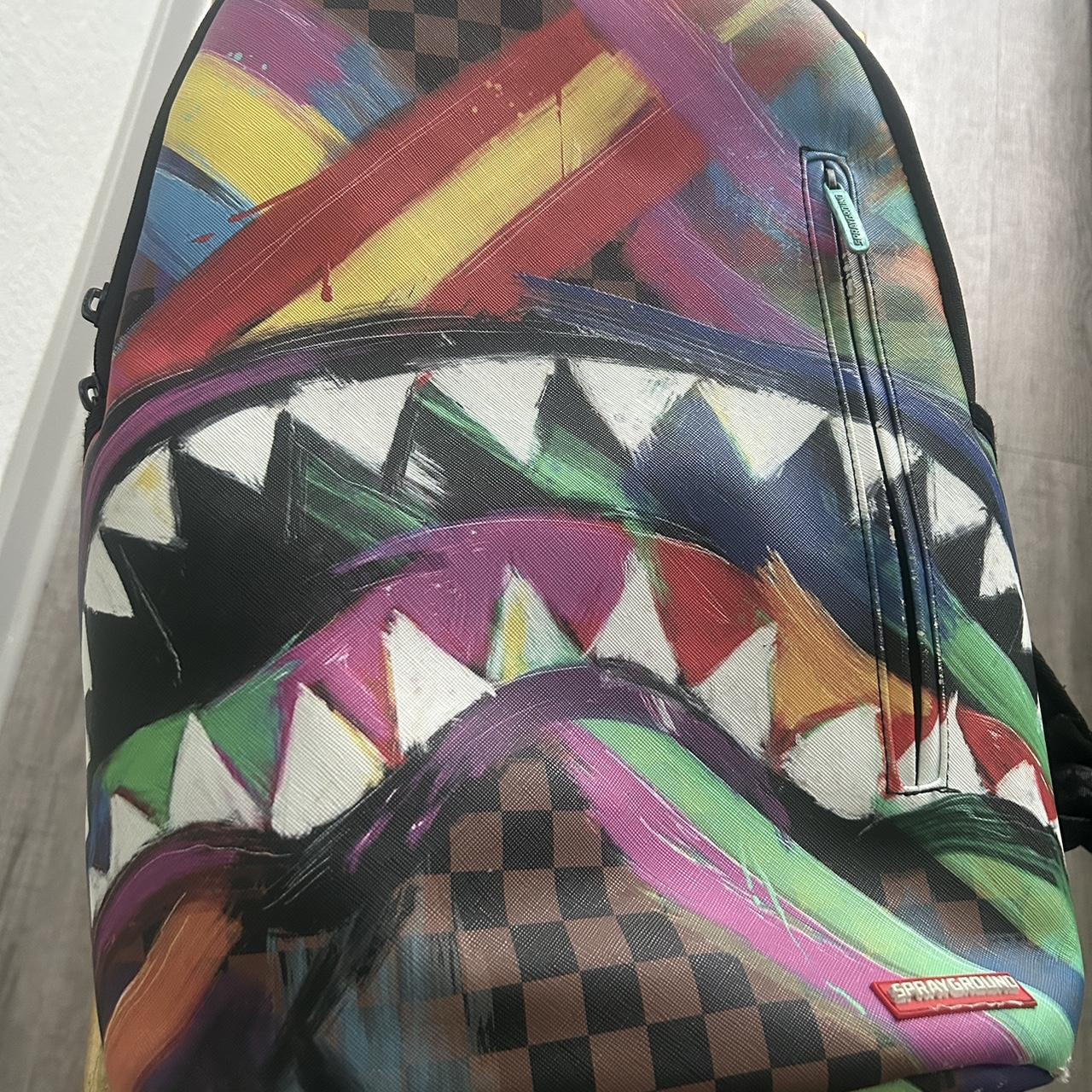 Spray ground backpack colorful - Depop