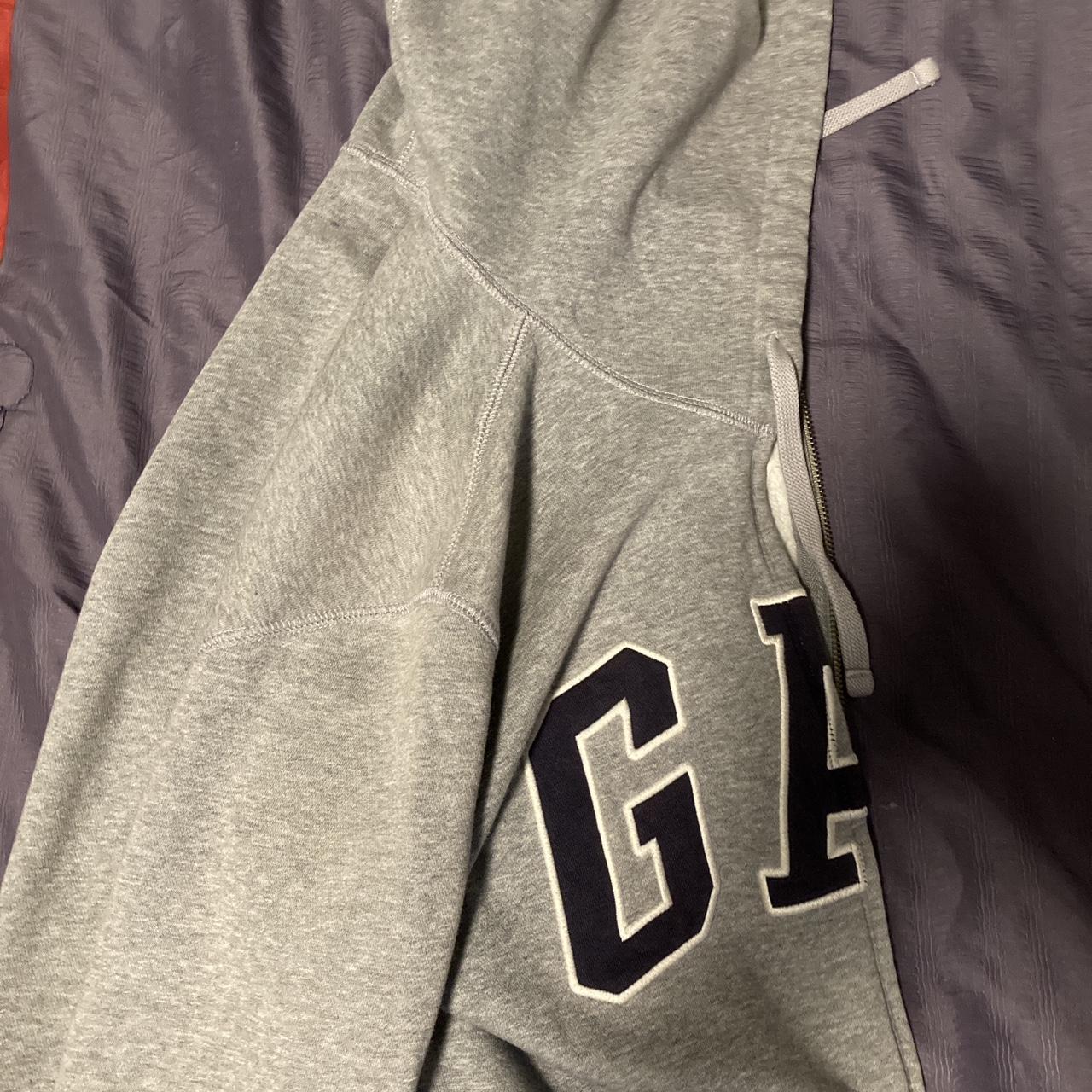 Gray gap zip up size small somewhat worn no stains... - Depop