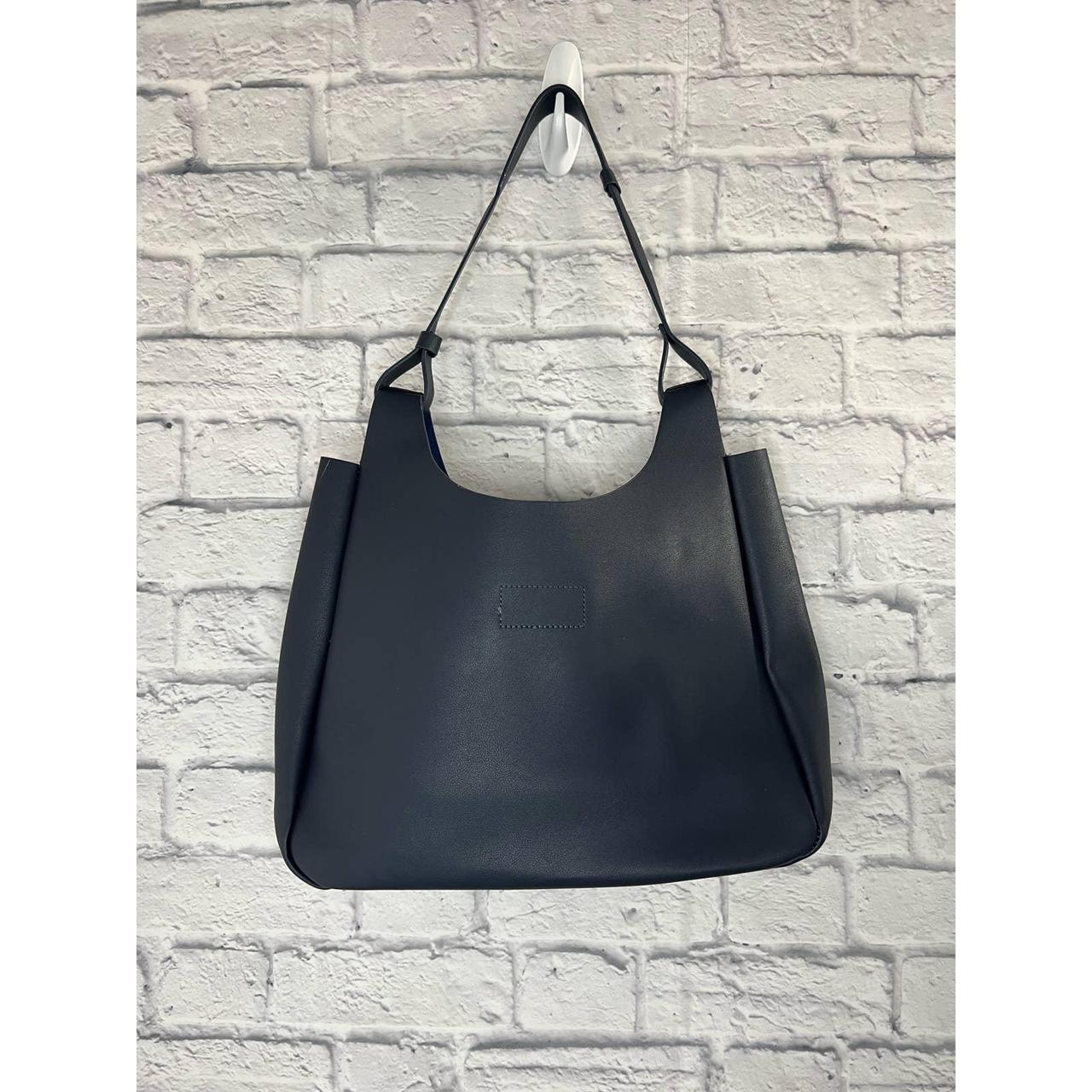 Vegan leather navy Neiman Marcus tote. Tote is in... - Depop