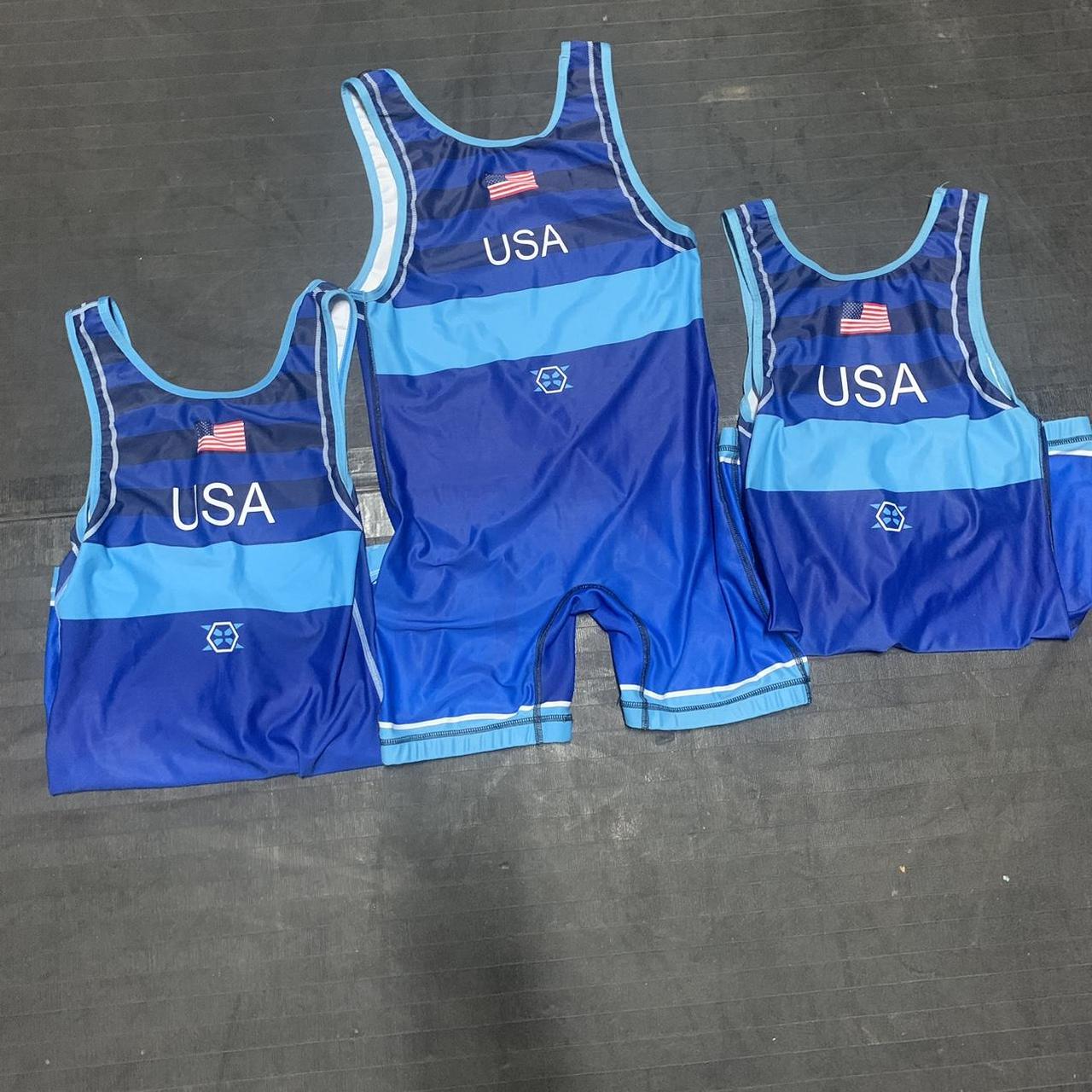 3 Spartan singlets two are size adult small and one... - Depop