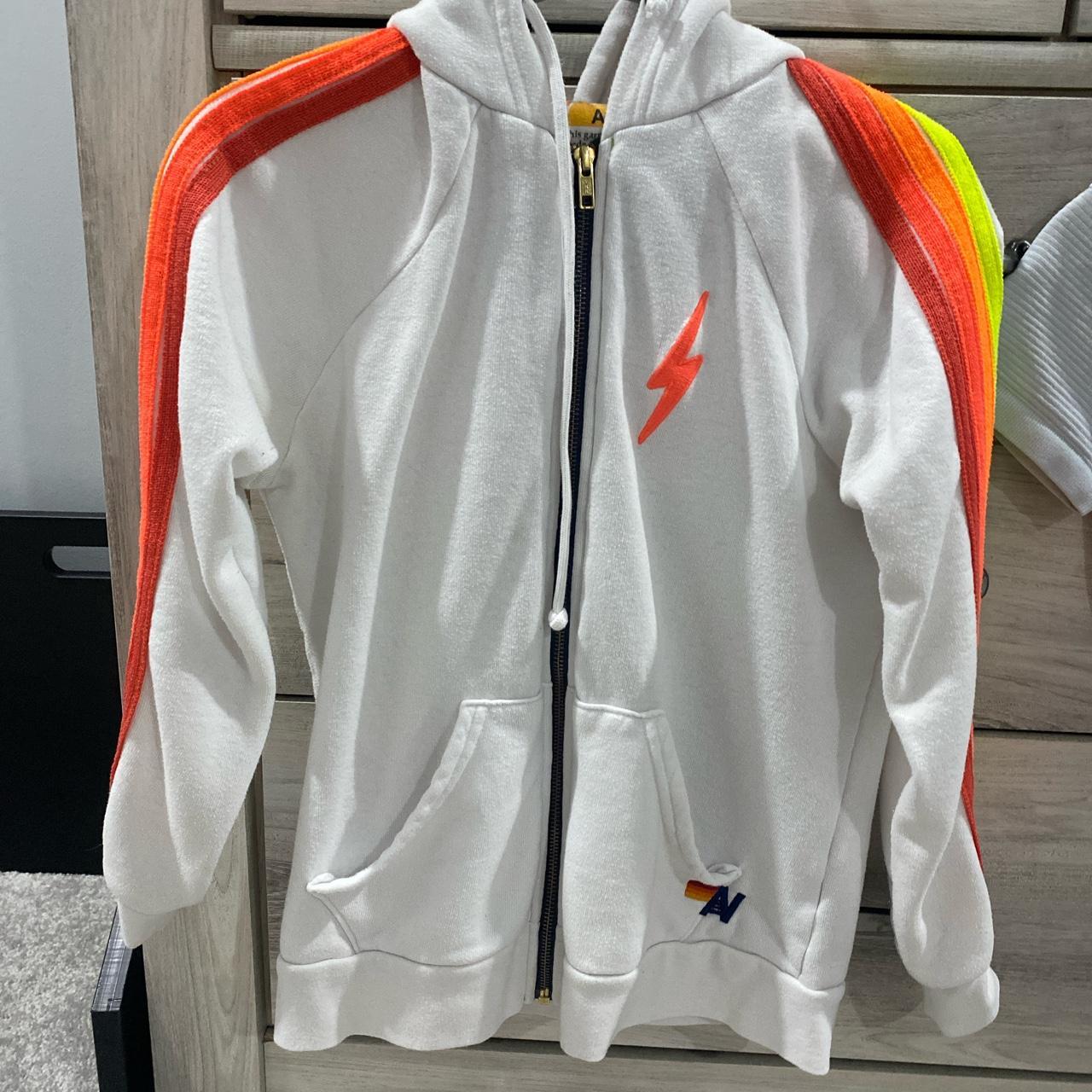 White Aviator Nation jacket with red, orange, and... - Depop