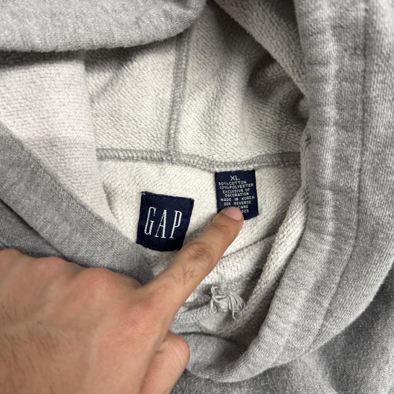 Grey Gap hoodie with embroidered spell out logo size... | Depop