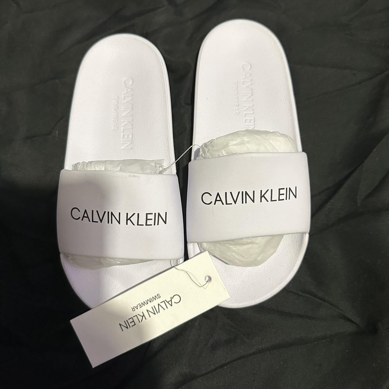 Kids size 11.5 sliders never worn them - Depop