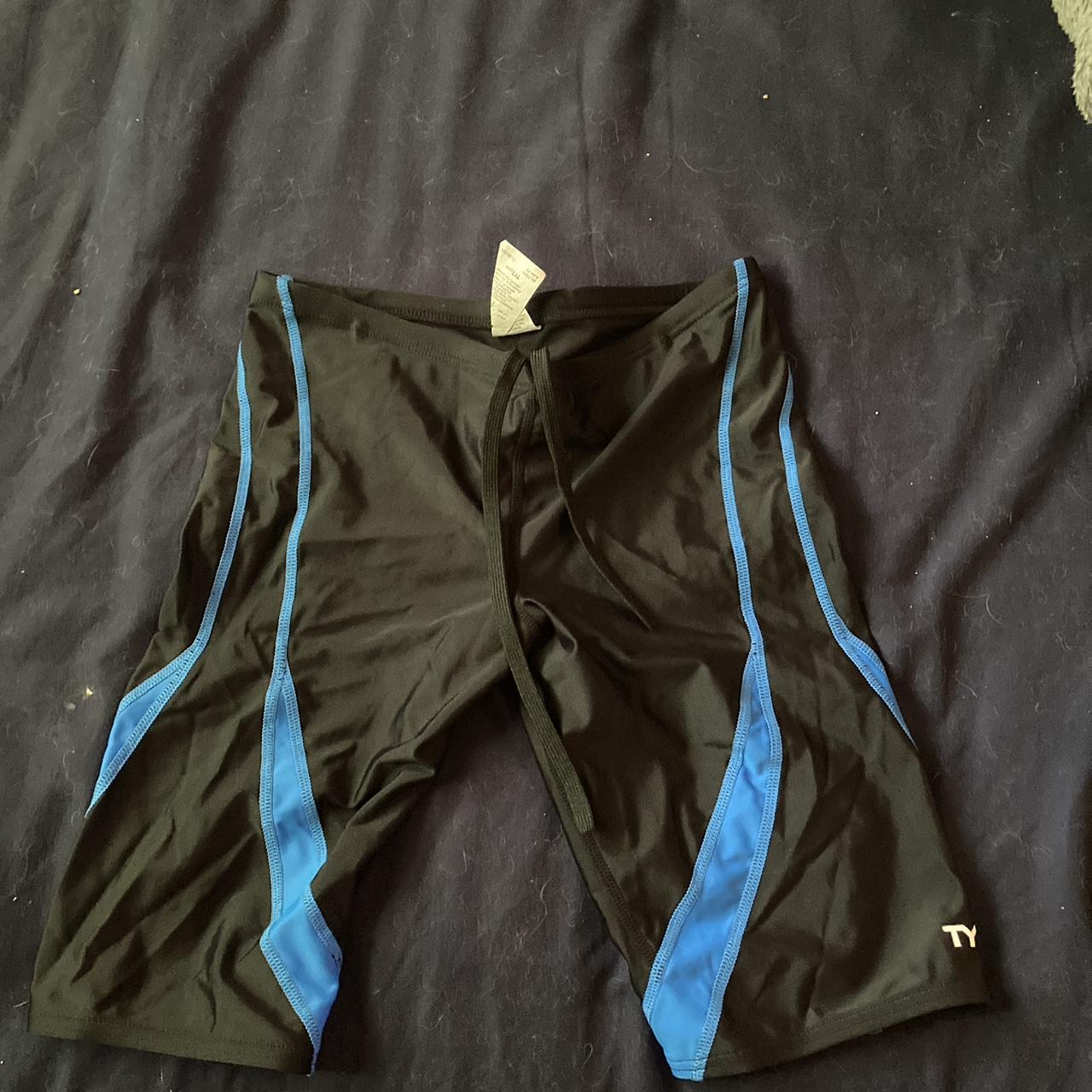 Black and blue speedo. Men’s Small and tight - Depop