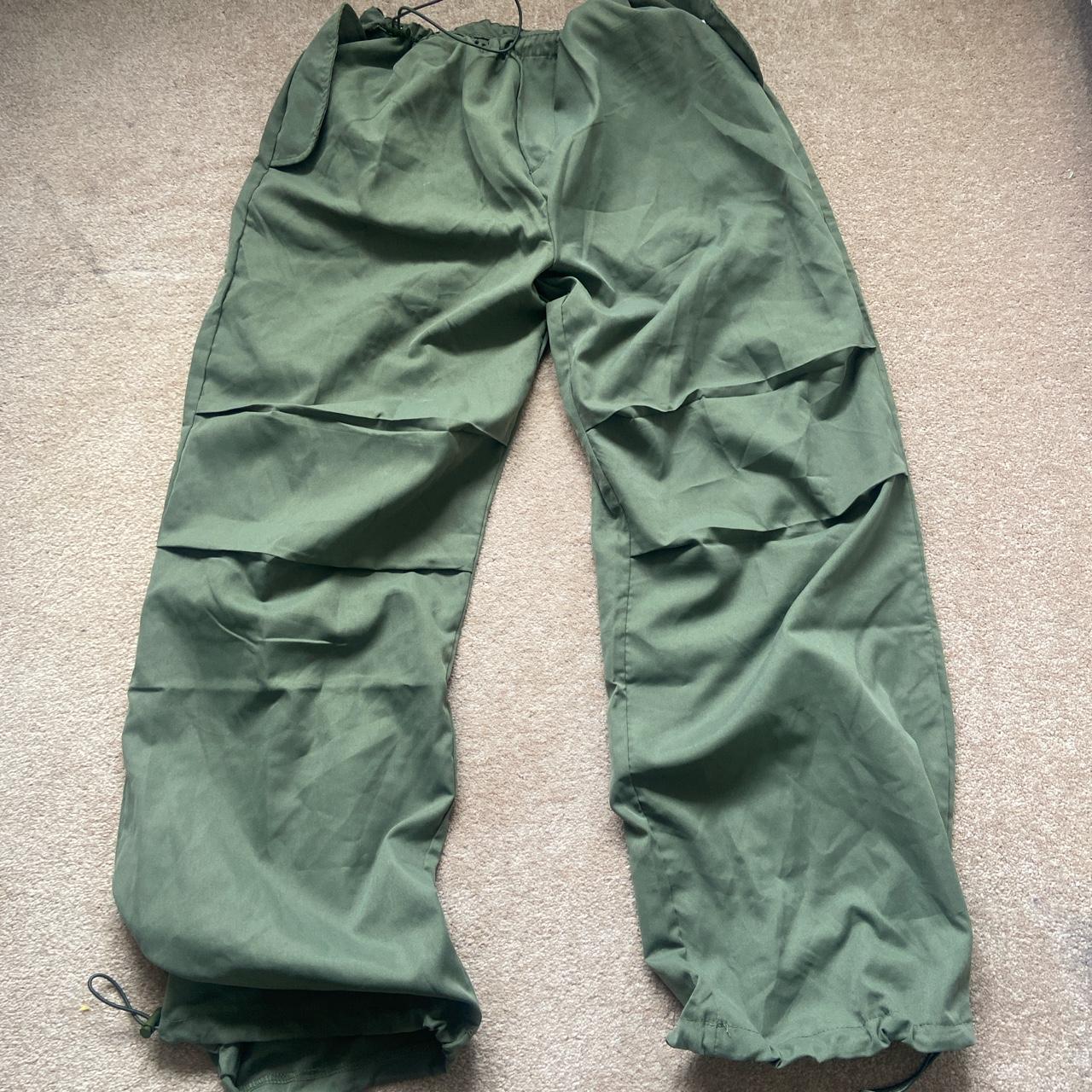 green parachute pants with adjustable toggles thin... - Depop