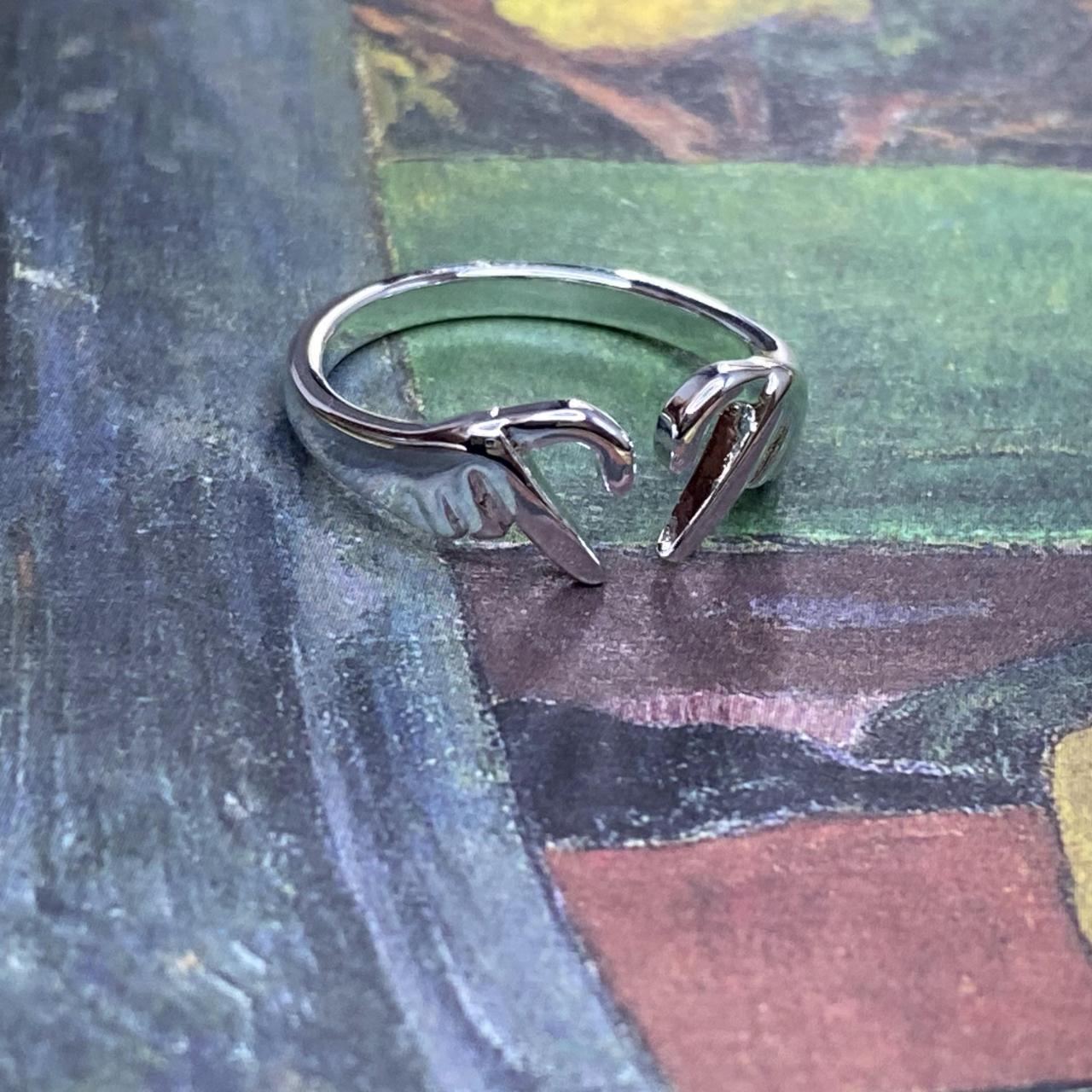 This is an open adjustable ring that fits perfectly... - Depop