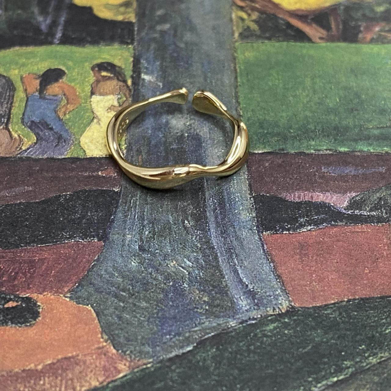 This is an open adjustable ring that fits perfectly... - Depop