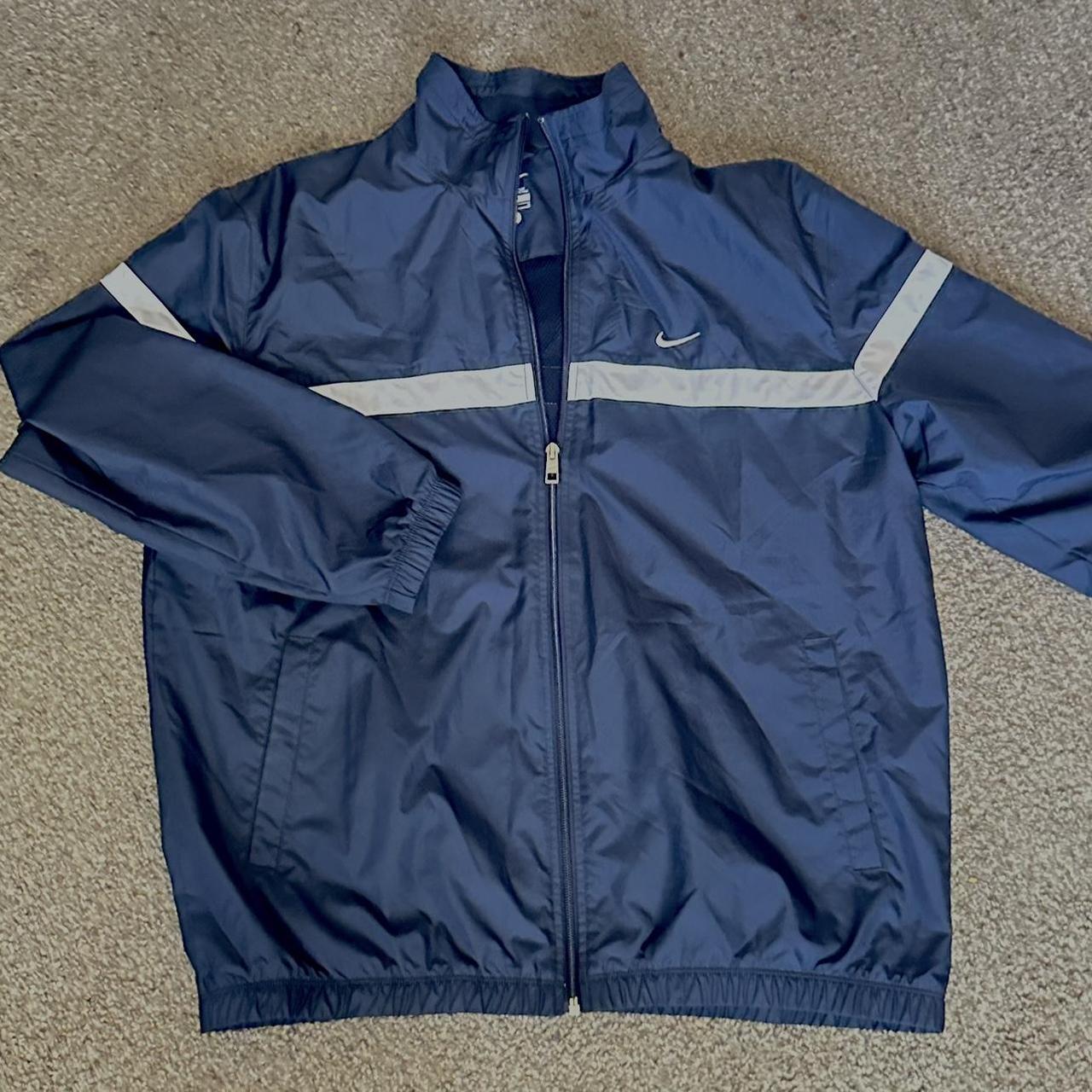 Navy blue Nike windbreaker - Depop