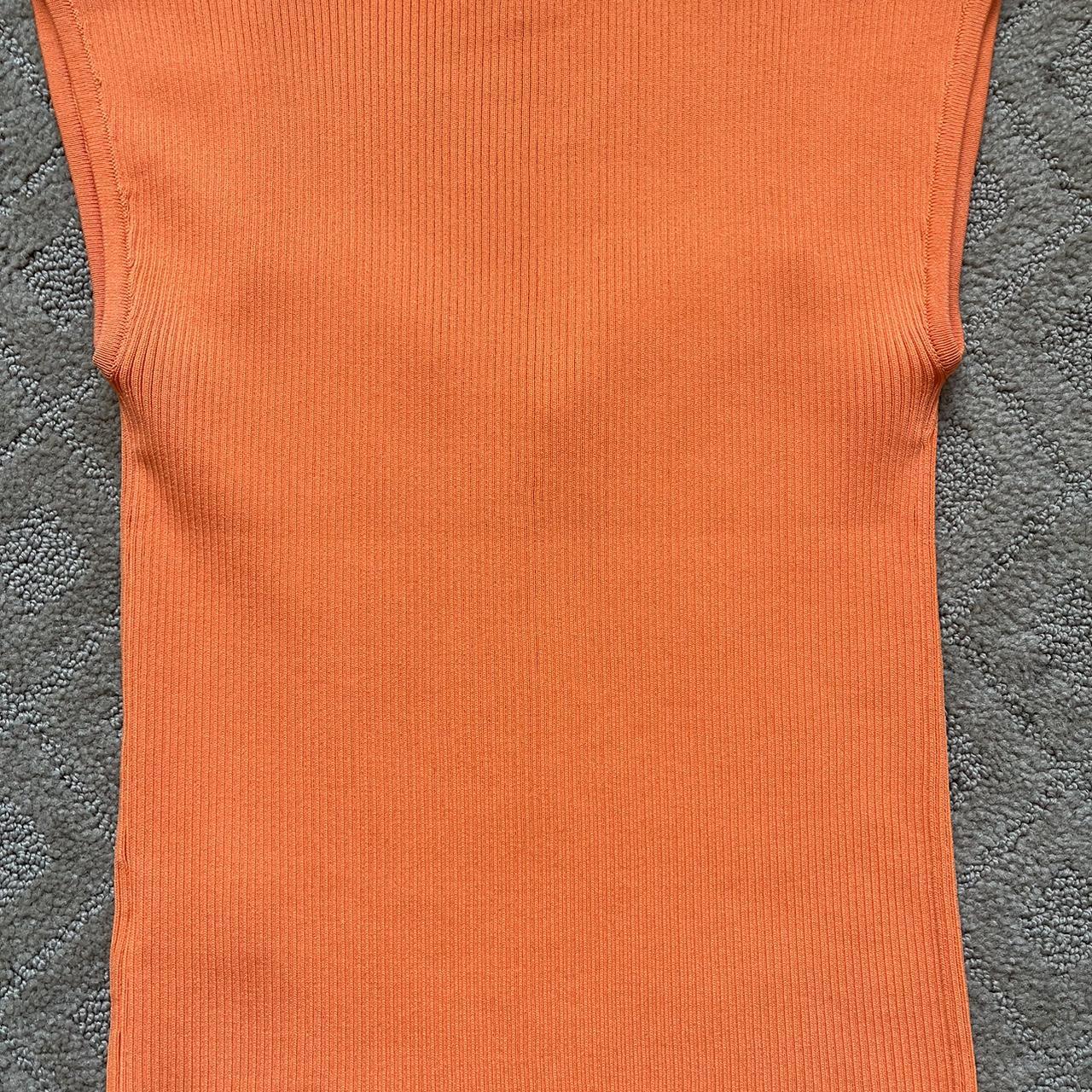 Orange top, never warn, size small, from LucyParis,... - Depop