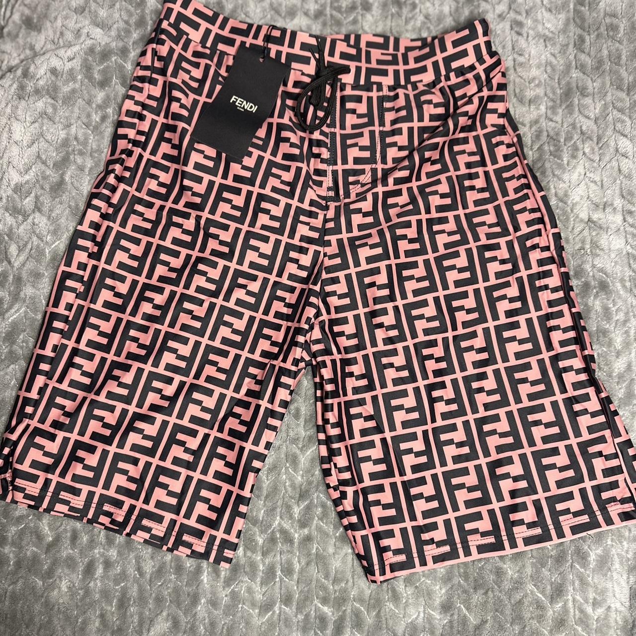 Rose gold & black swim shorts - Depop