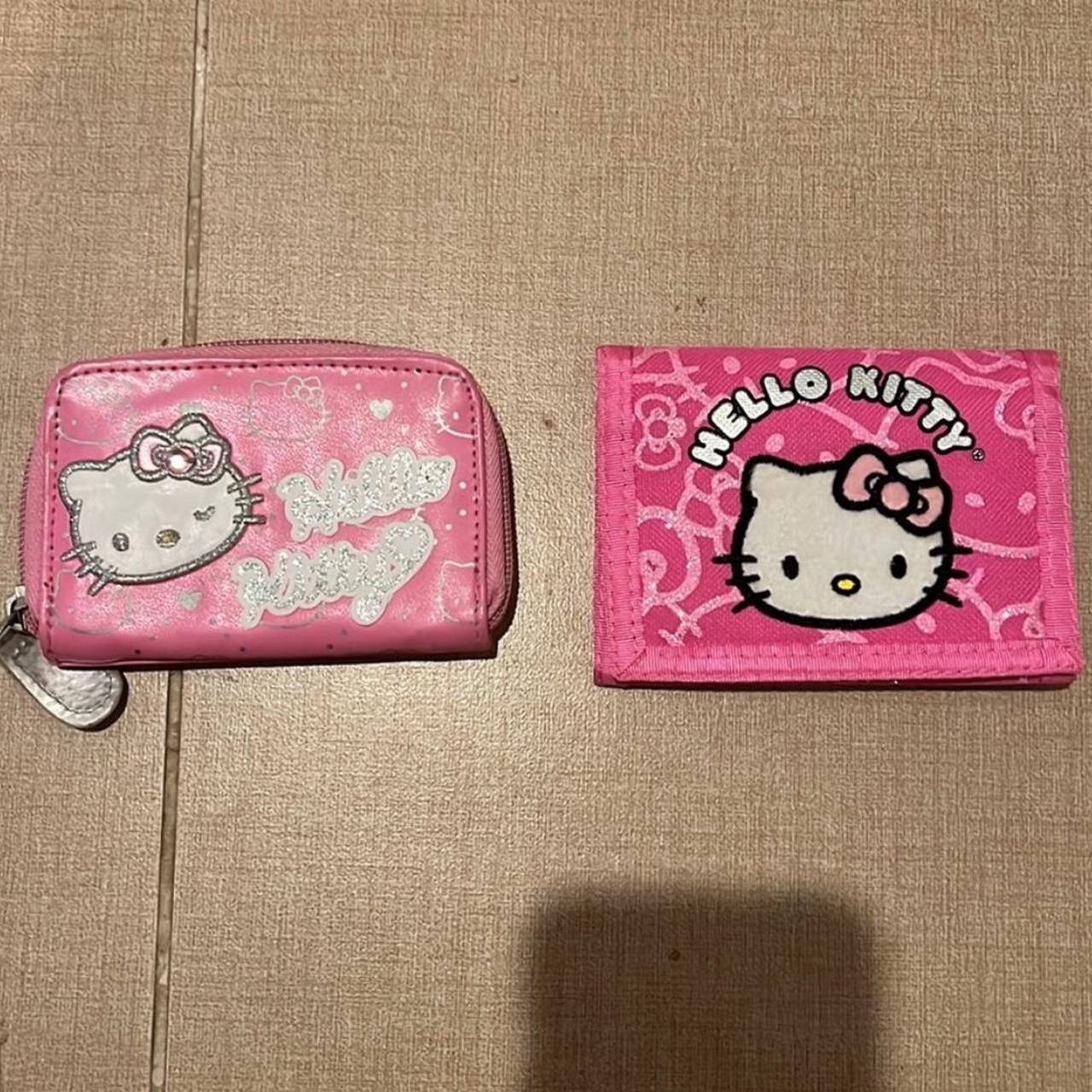 2 hello kitty wallets. Left one has a small blue... - Depop