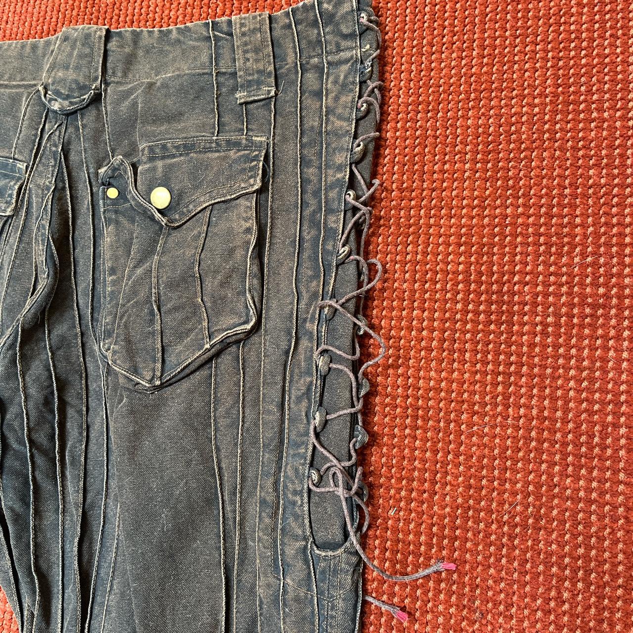 crazy stacked flared jeans w/ strings on the... - Depop