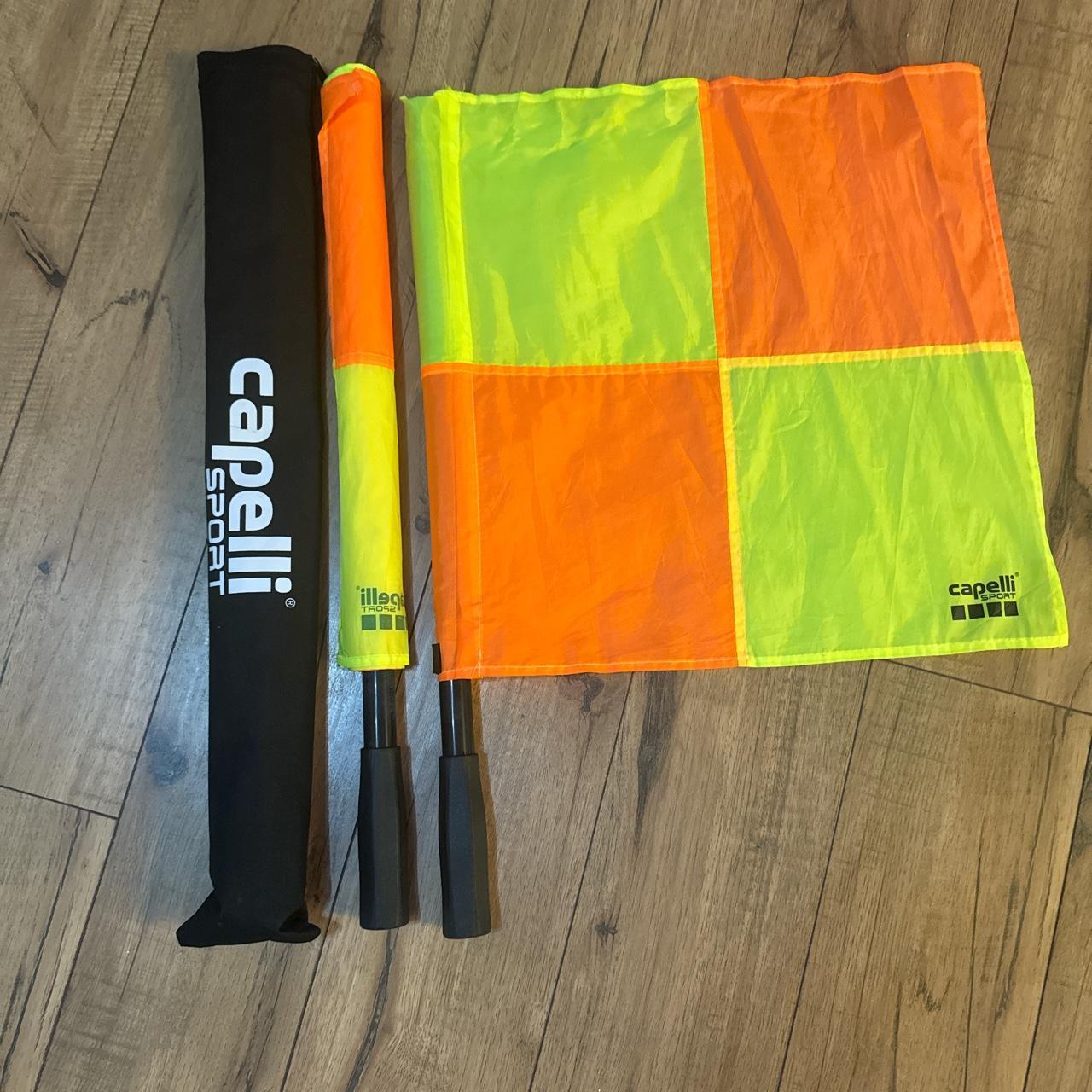 Capelli referee yellow and orange checkered flags.... - Depop