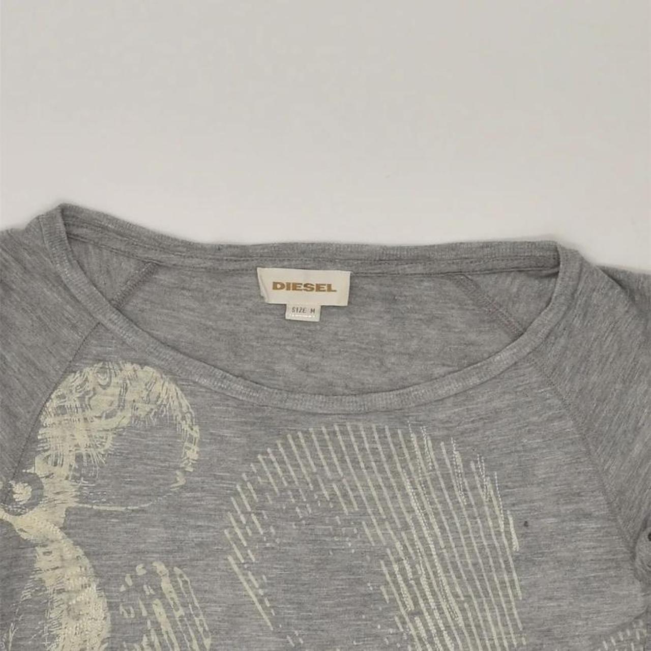 grey diesel tank top with graphic print and... - Depop