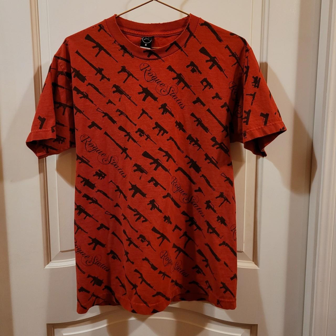 Rogue Status t-shirt, red with black graphics. Size... - Depop