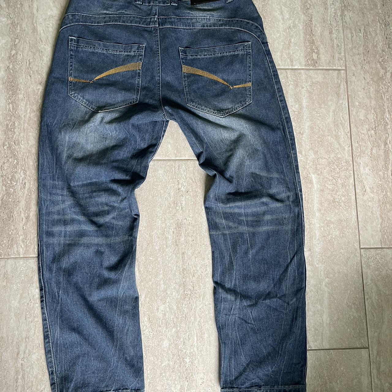 Ekko72 Unlmtd Play Bigg Jeans with embroidered... | Depop