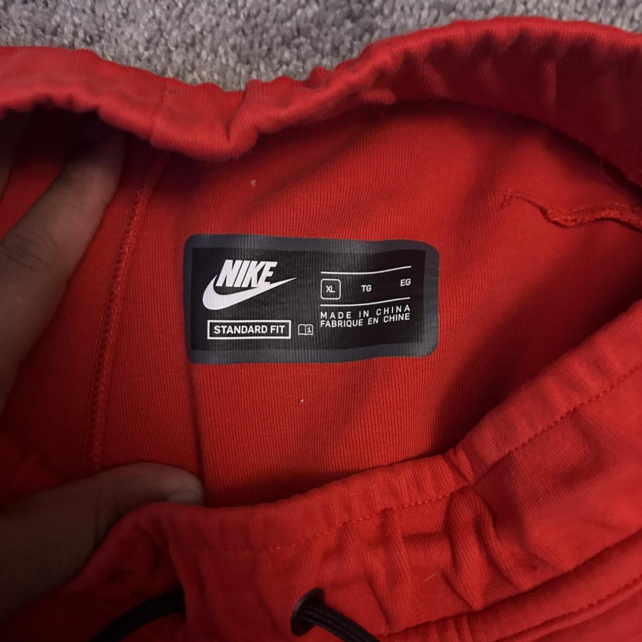 Red Nike tech pants Minor spill Kids size XL = ... - Depop