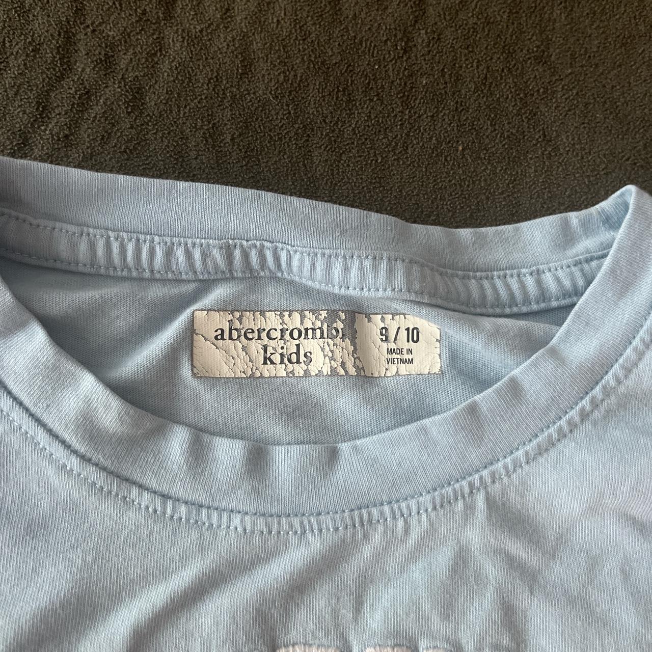 This is a light blue Abercrombie T-shirt perfect for... - Depop