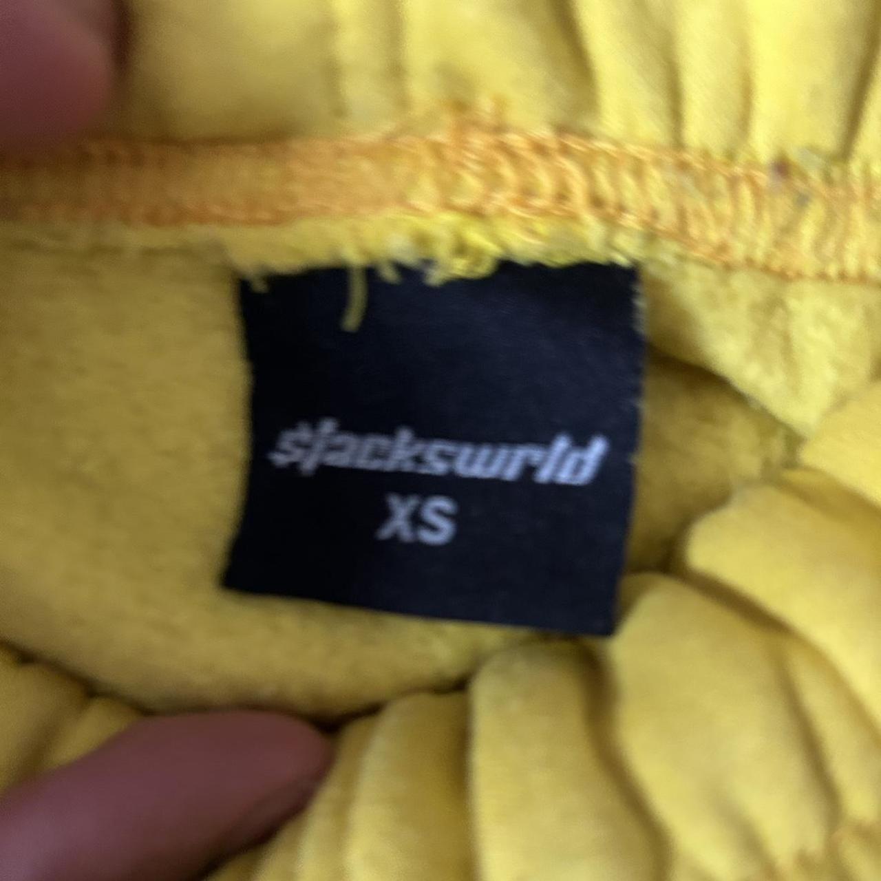 Black and yellow flared sweats size xs fits 28-30 - Depop