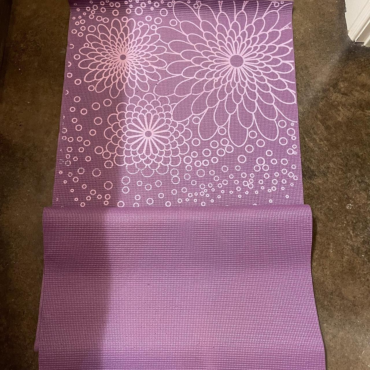 Purple yoga mat with flower design. Used a few times... - Depop