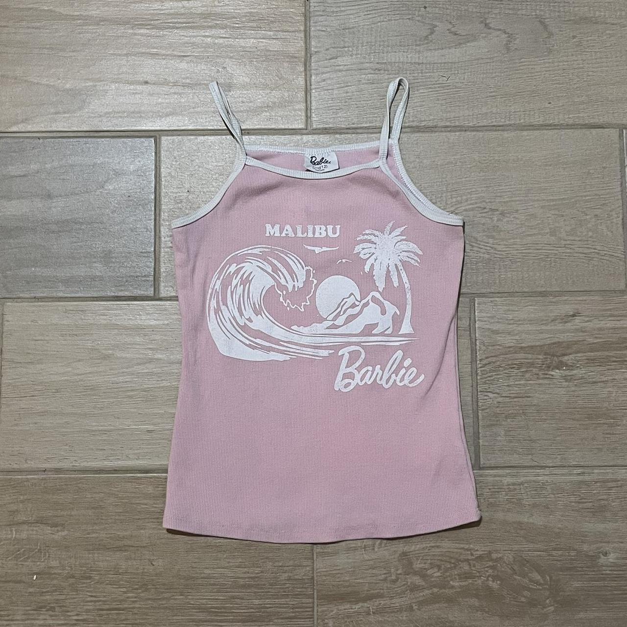 Pink Malibu Barbie tank. Adult size xs/s. There is a... - Depop