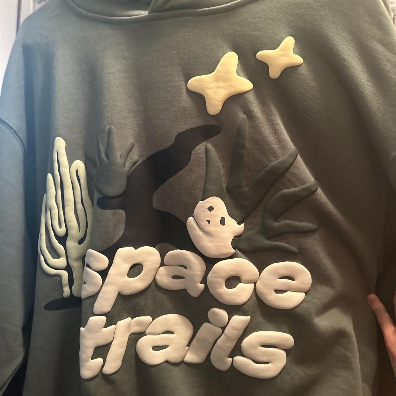 Medium broken planet space trails hoodie, worn once... - Depop