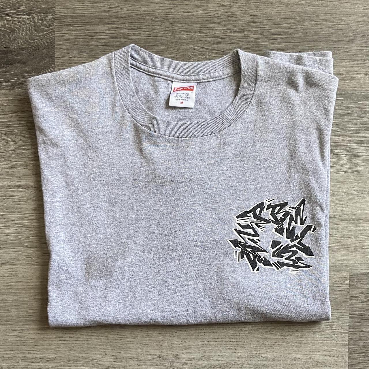 Grey SUPREME Graphic Tee Light stain on the front... - Depop