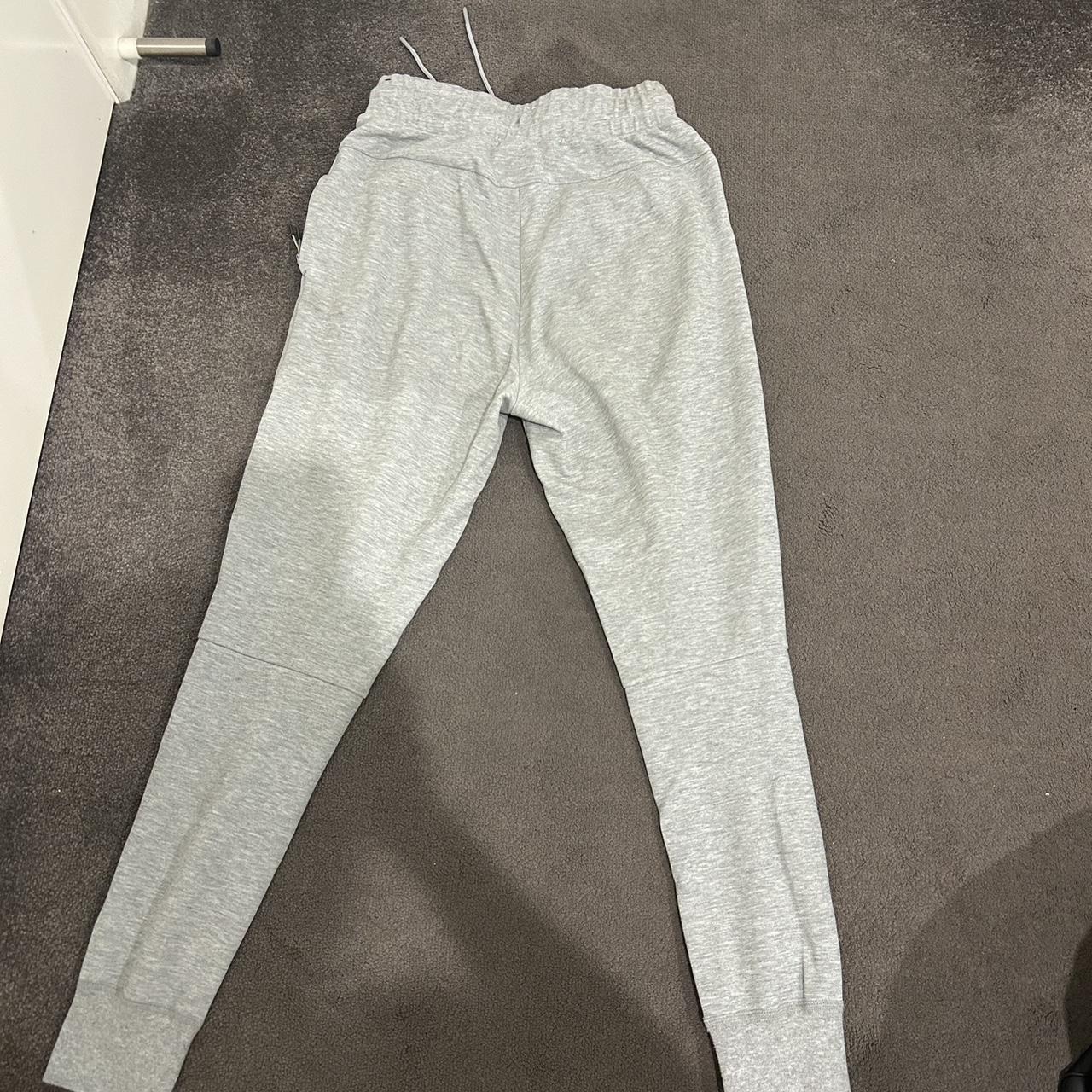 Grey Nike tech trackies - Depop