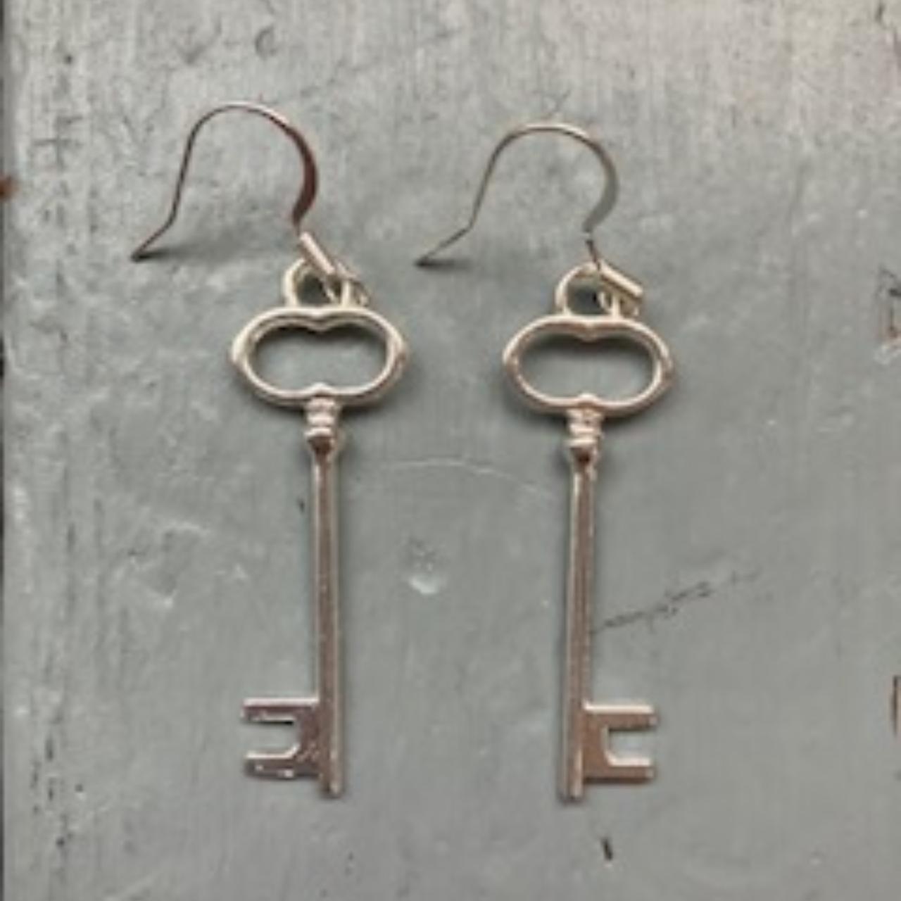 Key dangle earring. Key to my heart, key to success,... - Depop