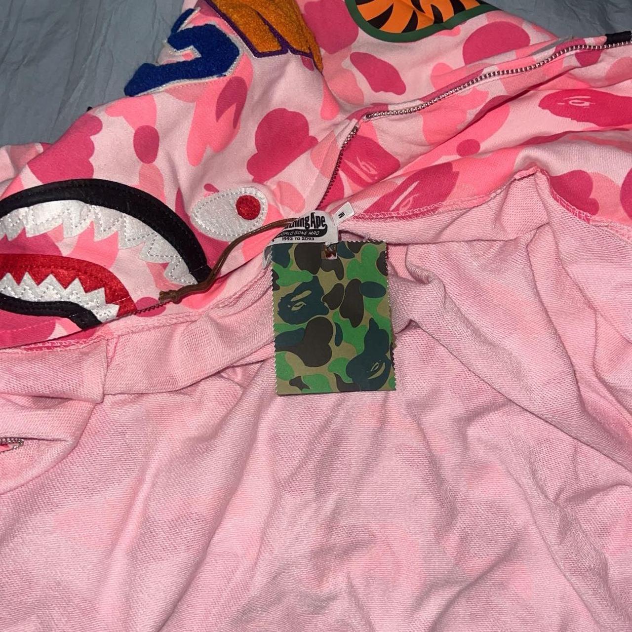 Pink BAPE hoodie, fits like a medium #BAPE #hoodie - Depop