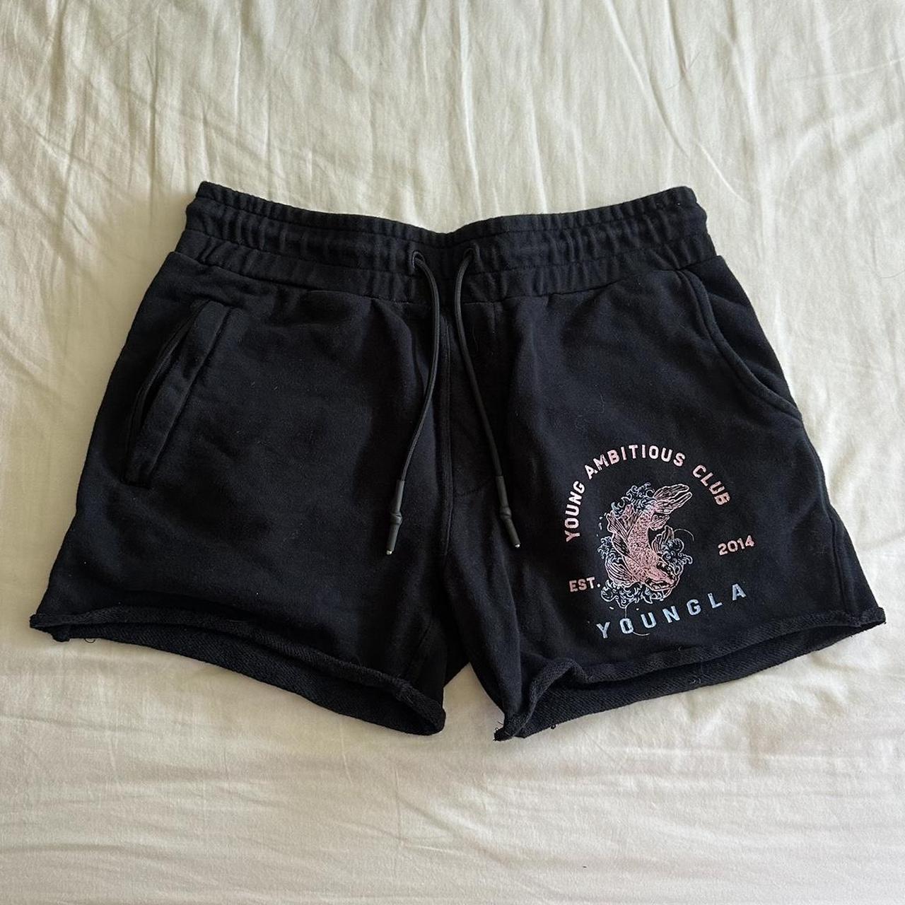 YongLA Young Ambitious Club black and pink shorts -... - Depop
