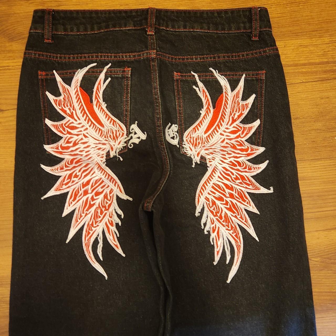 Red ape and raw blue style Angel cutlass wing jeans... - Depop