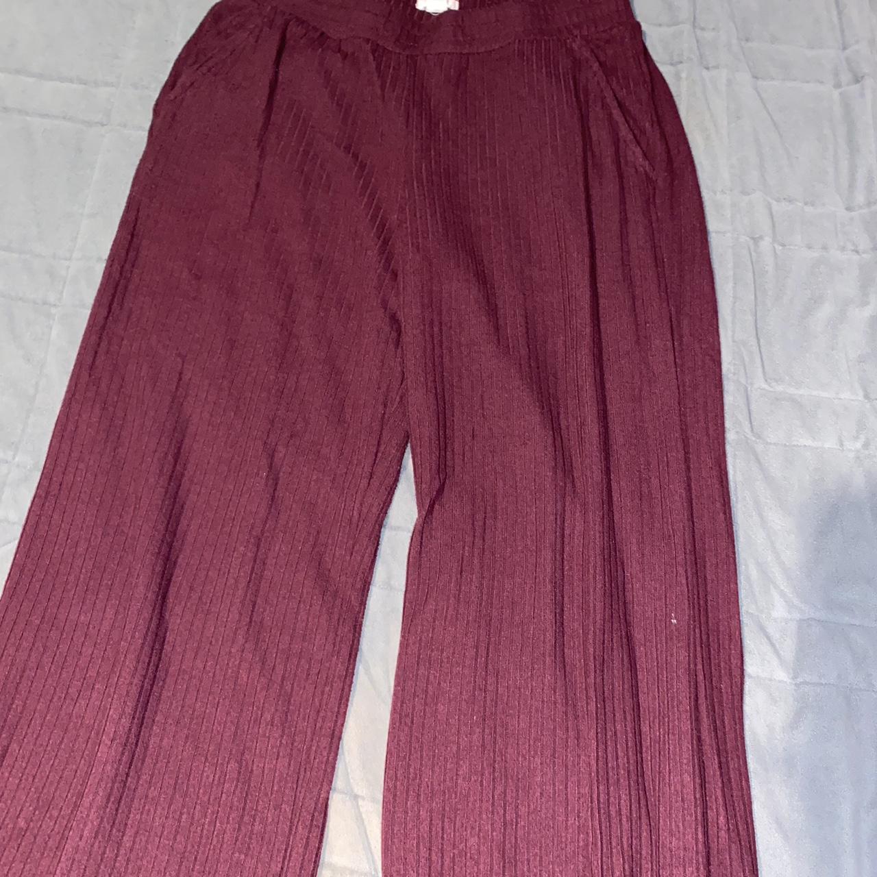 Maroon sweatpants that are Flare yoga pants style... - Depop