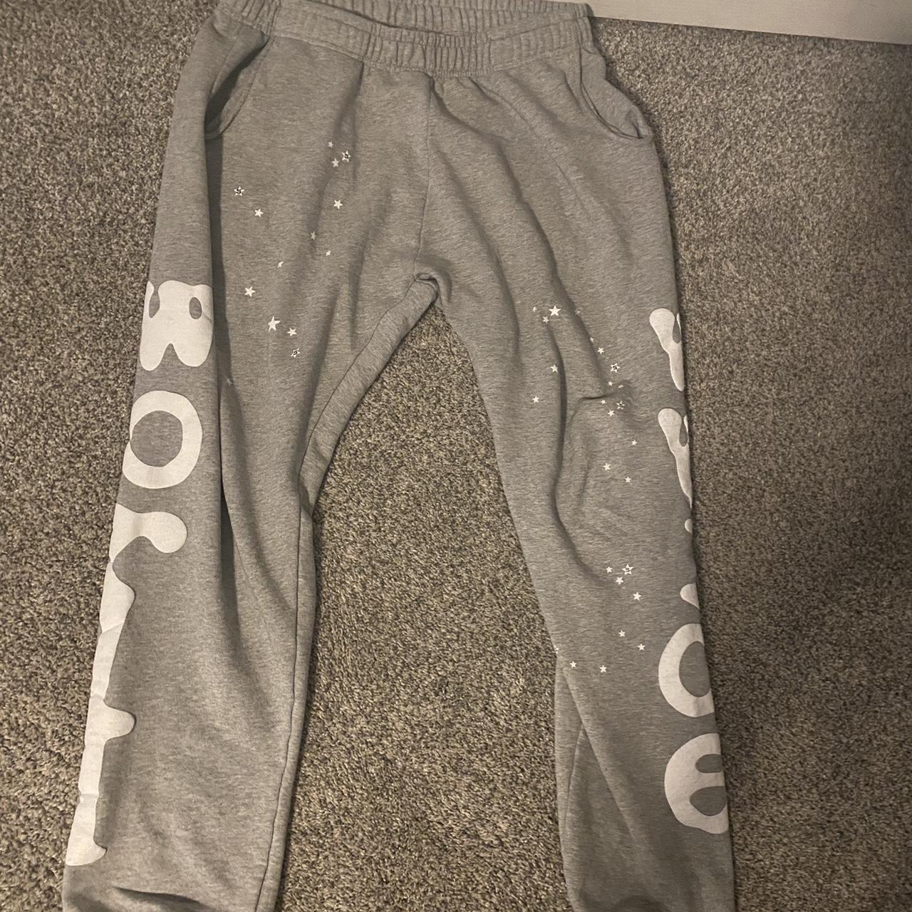 Grey Sp5der sweatpants worn a few times size: xl... - Depop