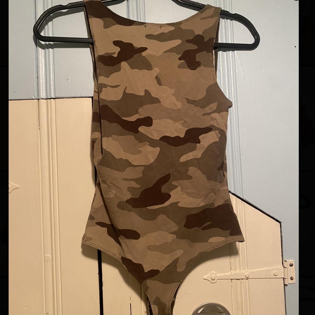 Camo body suit, strings in the front to show more or... - Depop