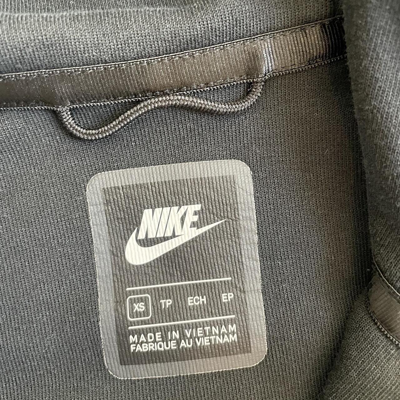 Youth extra small Nike tech has a sharpie mark but... - Depop