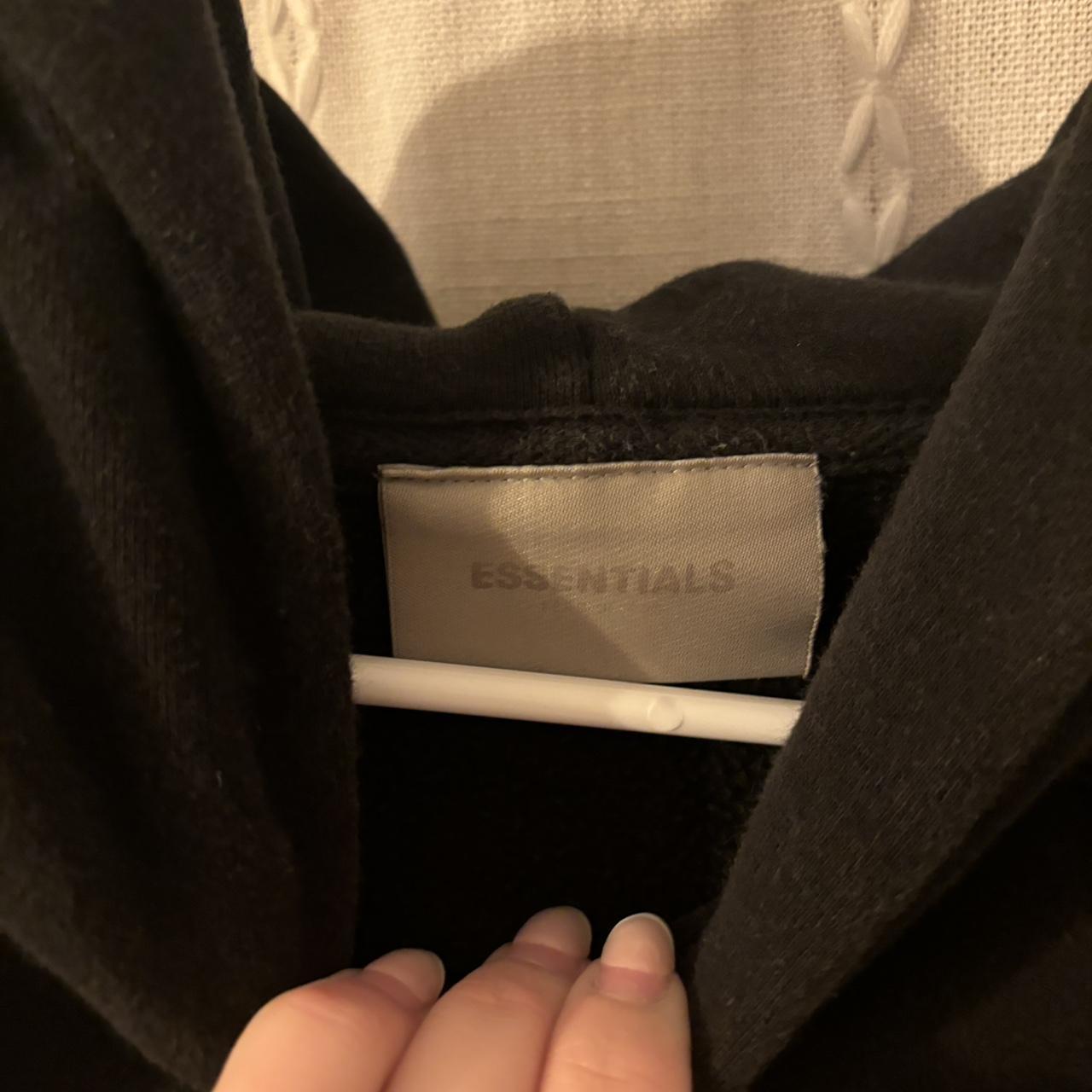 black essentials hoodie (runs a little baggie) - Depop