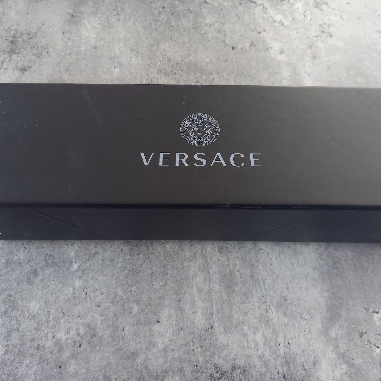Iconic versace design with medusa coins emblem... - Depop